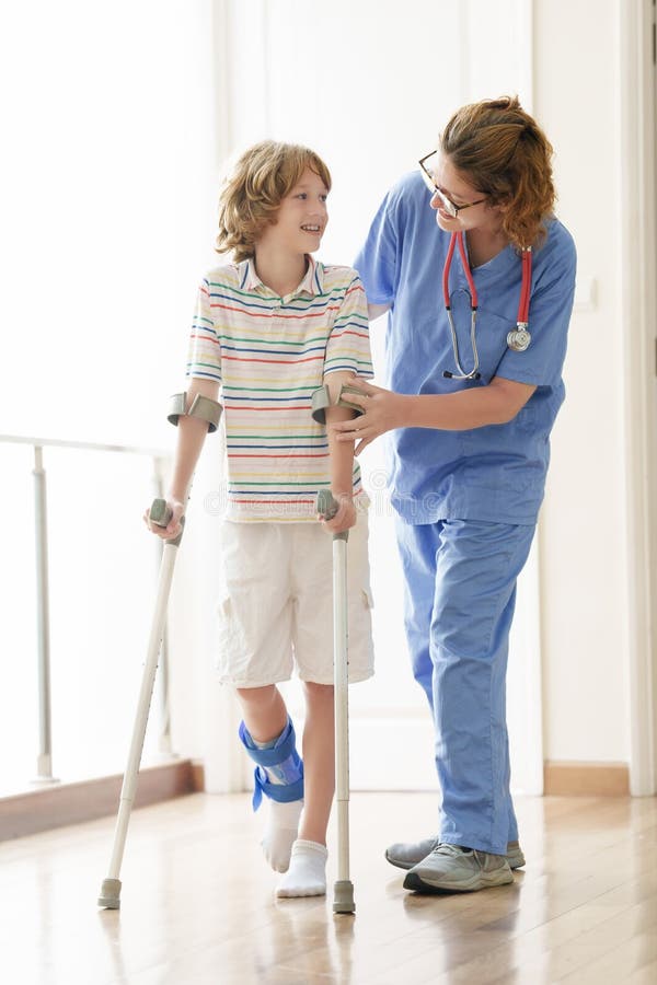 Injured Child on Crutches. Boy in Cast on Foot Stock Image - Image of ...