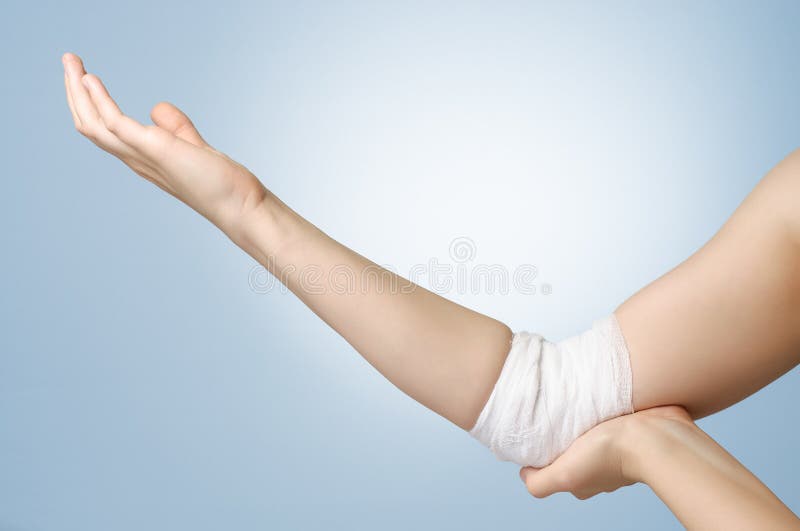 Injured elbow with bandage stock photo. Image of bandaged - 83291558