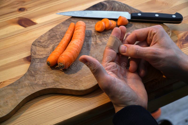 Injured in the Kitchen while Cooking Stock Photo - Image of background ...