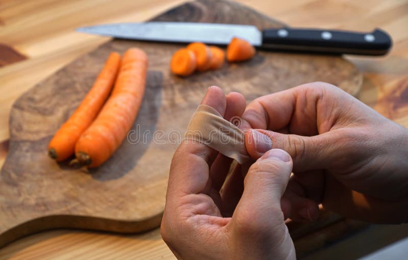Injured in the Kitchen while Cooking Stock Photo - Image of background ...