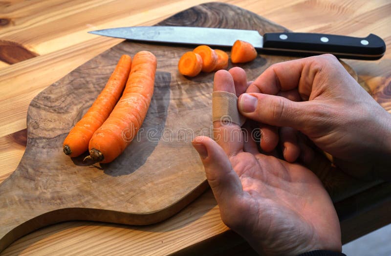 Injured in the Kitchen while Cooking Stock Photo - Image of cast, board ...