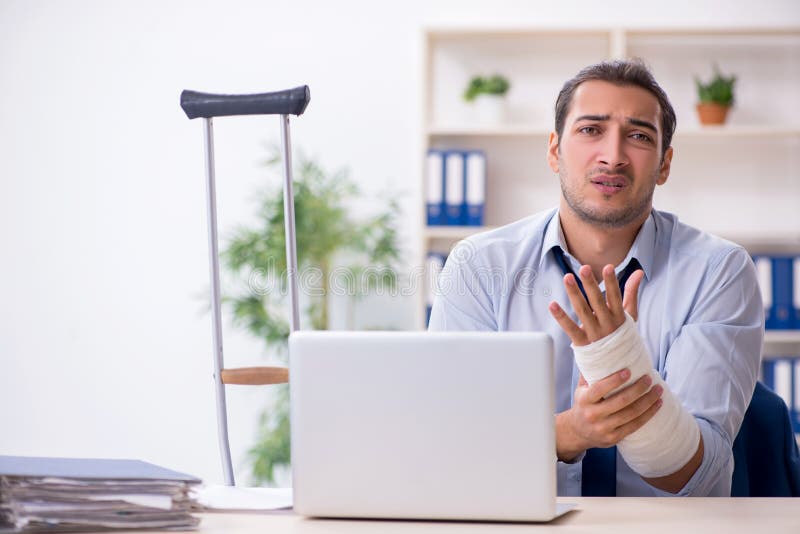 Injured Male Employee at Workplace after Accident Stock Photo - Image ...