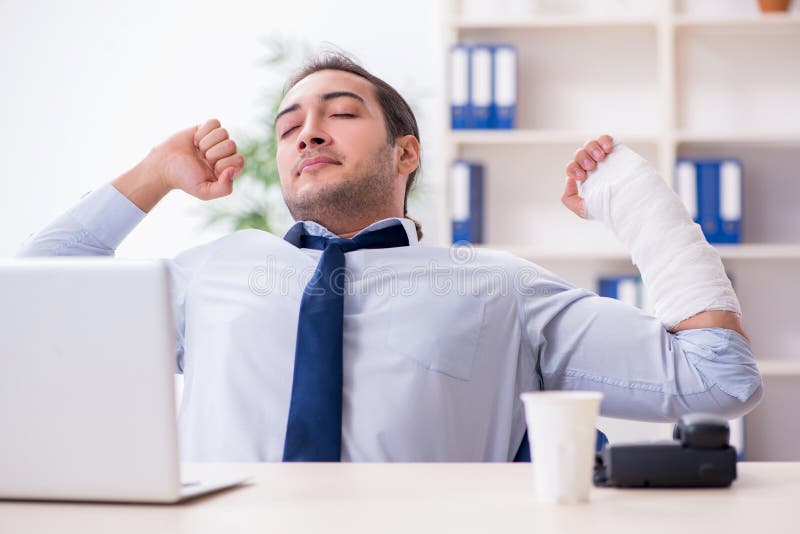 Injured Male Employee at Workplace after Accident Stock Image - Image ...