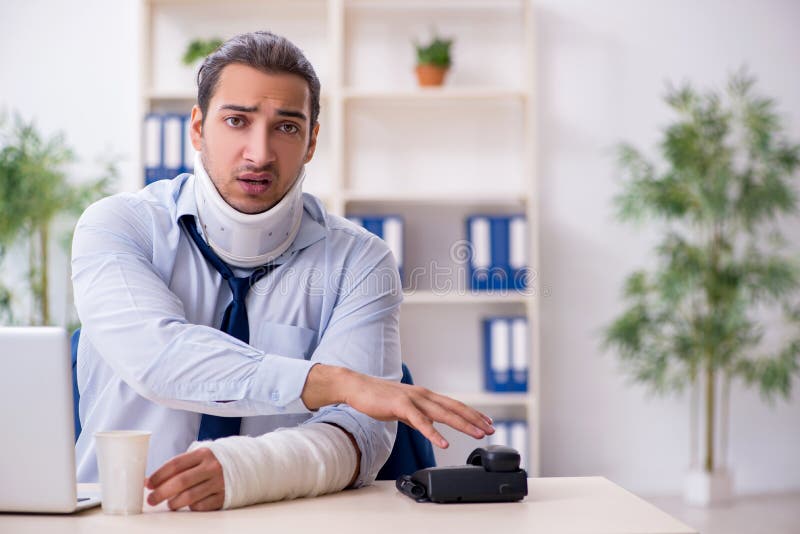 Injured Male Employee at Workplace after Accident Stock Image - Image ...