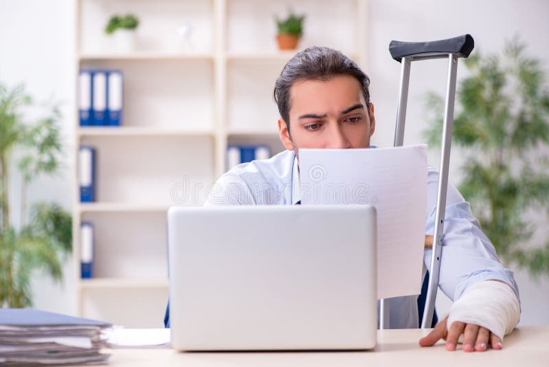 Injured Male Employee at Workplace after Accident Stock Photo - Image ...