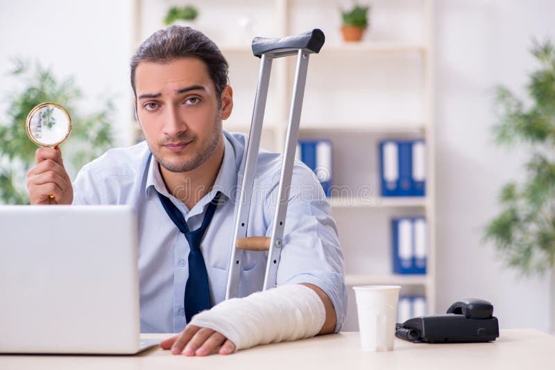 Injured Male Employee at Workplace after Accident Stock Image - Image ...