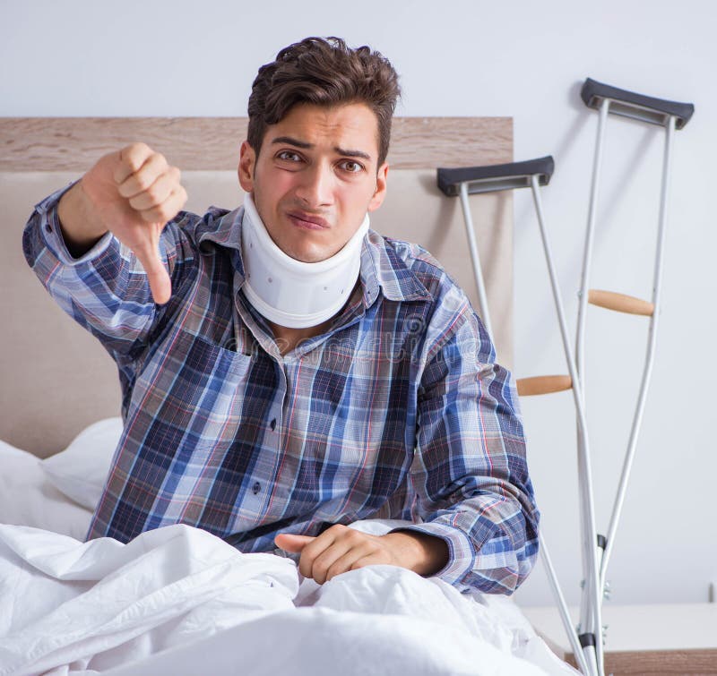 Injured Man in Bed at Home with Crutches Stock Photo - Image of care ...