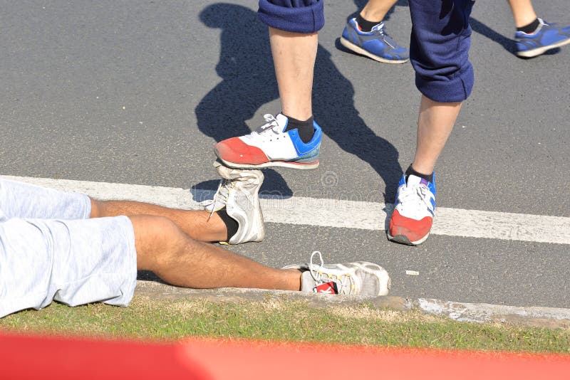 Injured Marathon Runner Legs Stock Photo - Image of competition, city ...