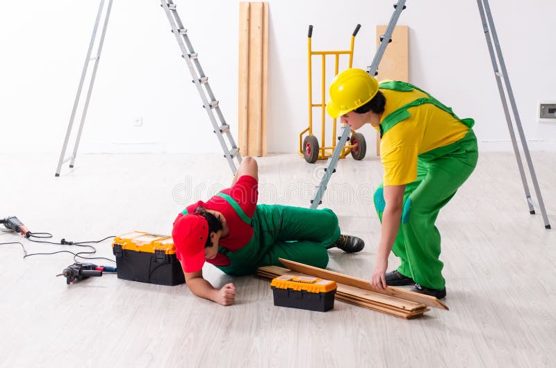 Injured Worker and His Workmate Stock Image - Image of construction ...