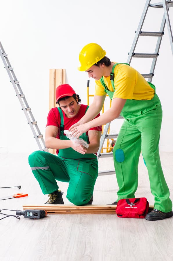 The Injured Worker and His Workmate Stock Image - Image of bandage ...