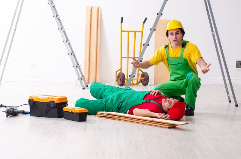 Injured Worker and His Workmate Stock Photo - Image of foreman ...