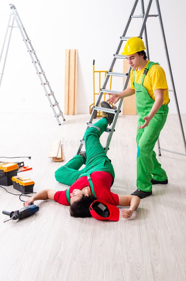 Injured Worker and His Workmate Stock Photo - Image of injured ...
