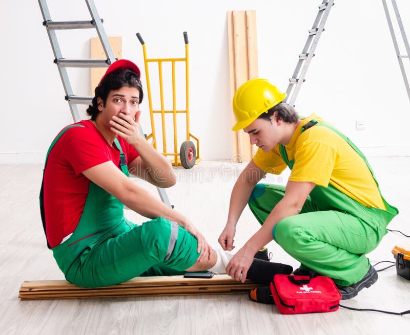 Injured Worker and His Workmate Stock Photo - Image of physical ...