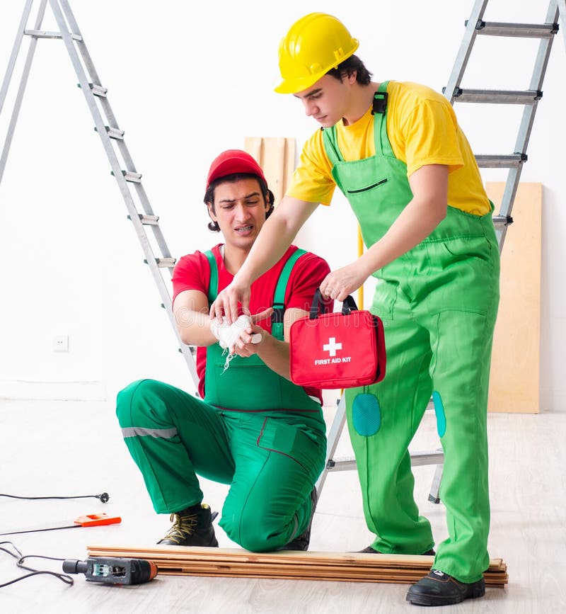 Injured Worker and His Workmate Stock Photo - Image of bandage ...