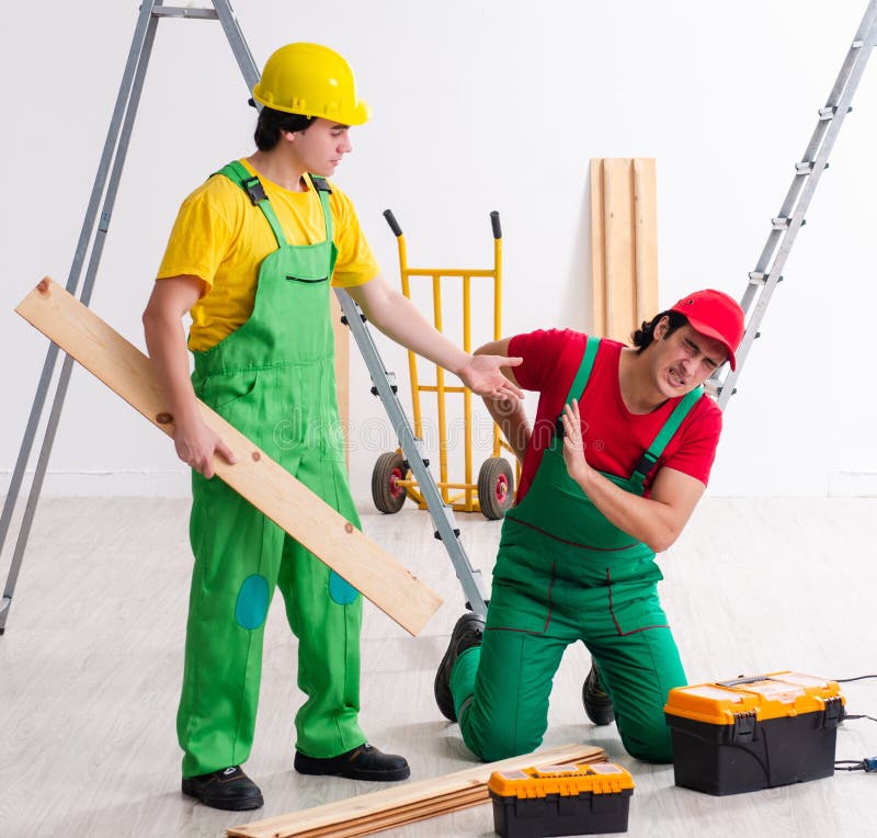 Injured Worker and His Workmate Stock Photo - Image of construction ...