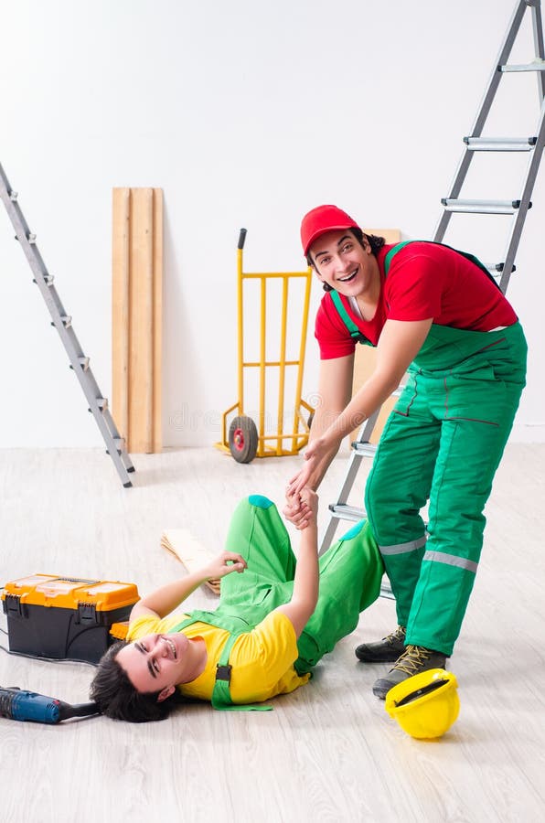Injured Worker and His Workmate Stock Photo - Image of disability ...