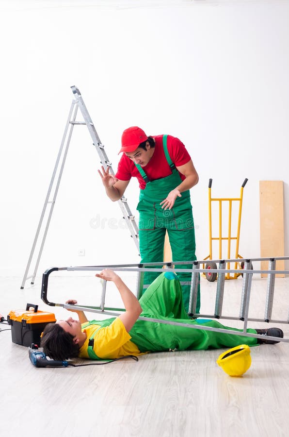 Injured Worker and His Workmate Stock Image - Image of fall, foreman ...