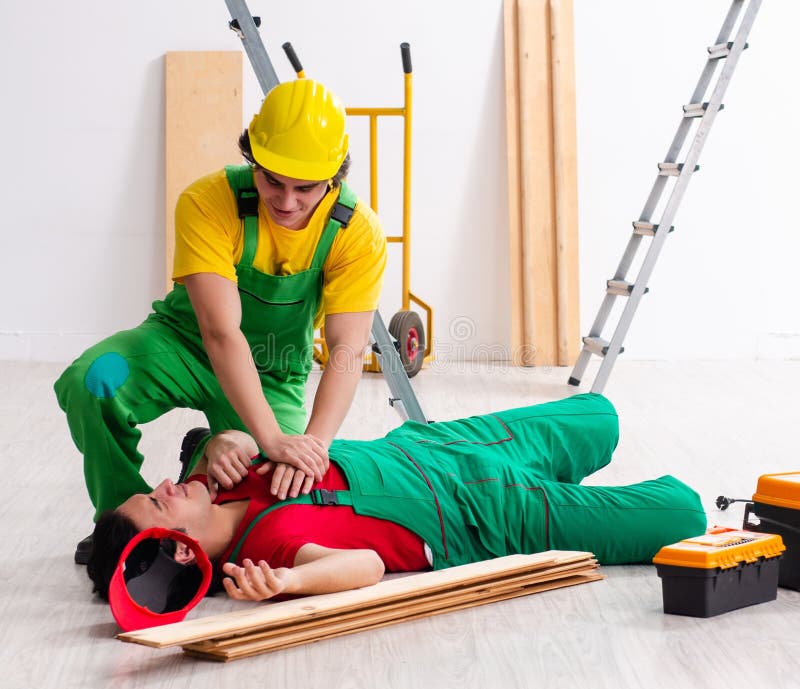 Injured Worker and His Workmate Stock Image - Image of fall, foreman ...