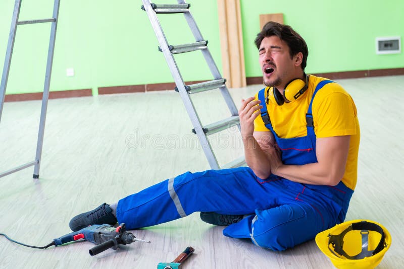 The Injured Worker at the Work Site Stock Photo - Image of casualty ...