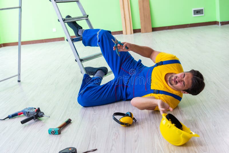 The Injured Worker at the Work Site Stock Photo - Image of dangerous ...