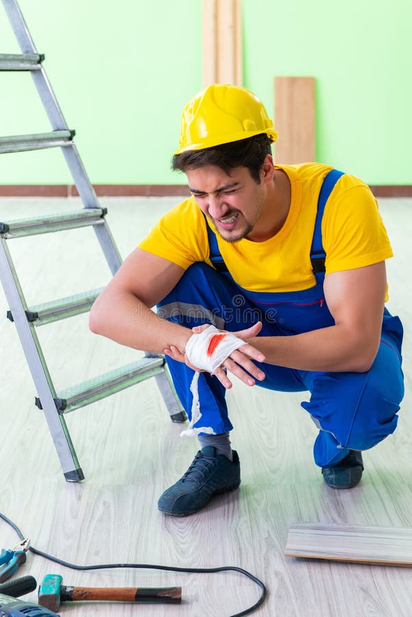 The Injured Worker at the Work Site Stock Photo - Image of accident ... The Injured Worker at the Work Site Stock Photo - Image of accident ...