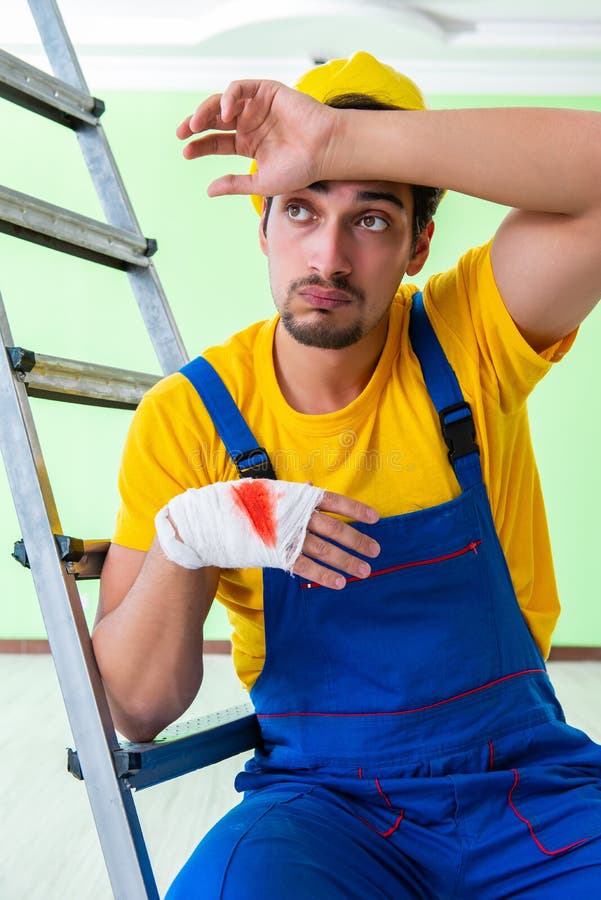 The Injured Worker at the Work Site Stock Image - Image of glove ...