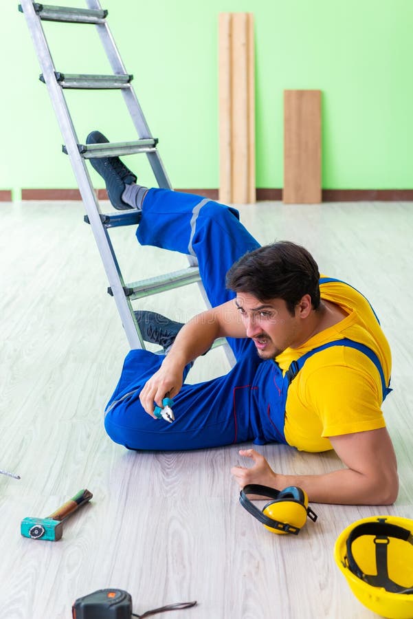 The Injured Worker at the Work Site Stock Image - Image of emergency ...