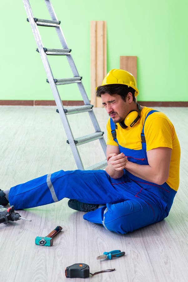 The Injured Worker at the Work Site Stock Image - Image of insurance ...