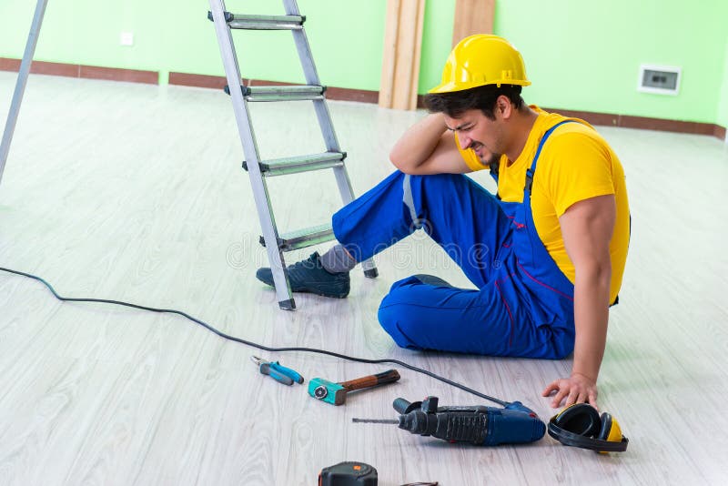 The Injured Worker at the Work Site Stock Image - Image of industry ...