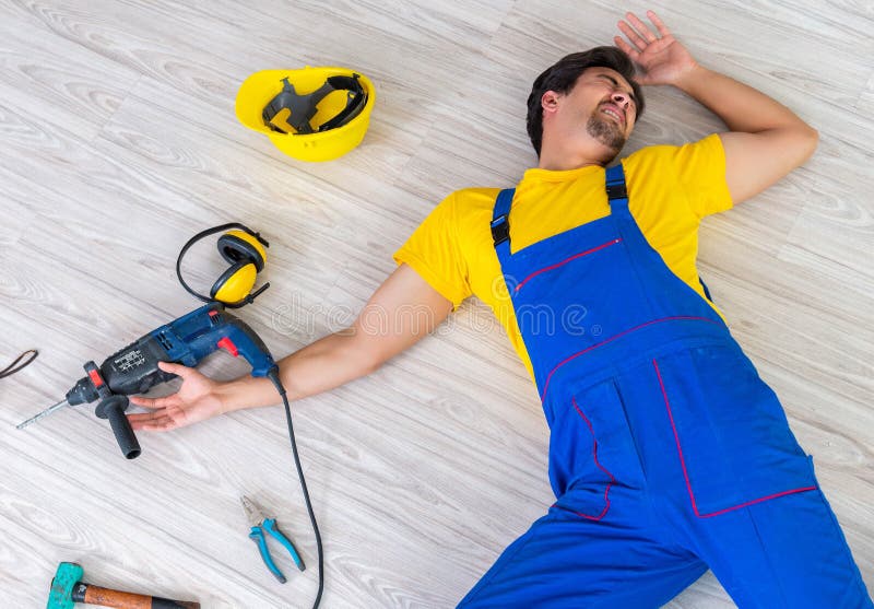 Injured Worker Being Assisted by Doctor Stock Photo - Image of ...