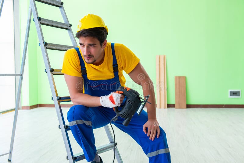 The Injured Worker at the Work Site Stock Photo - Image of medical ... The Injured Worker at the Work Site Stock Photo - Image of medical ...