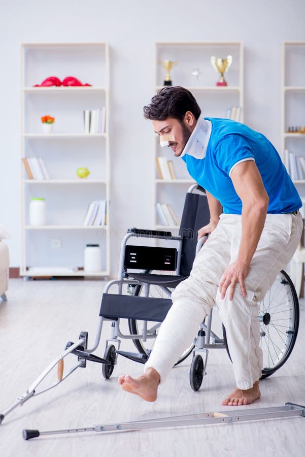 The Injured Young Man Recovering at Home Stock Photo - Image of ...
