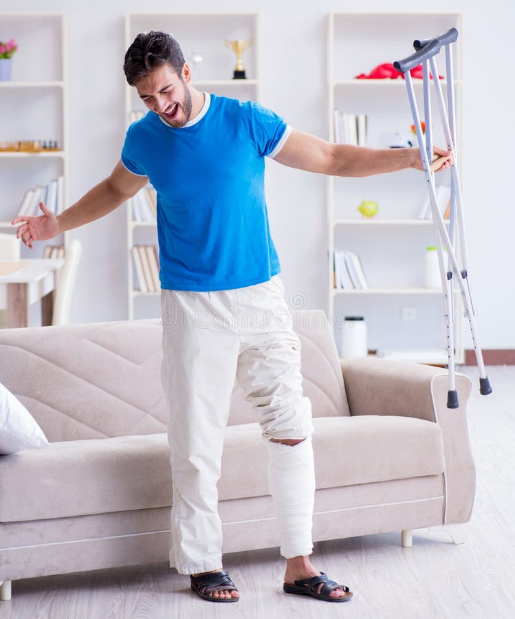 Injured Young Man Recovering at Home Stock Photo - Image of invalid ...