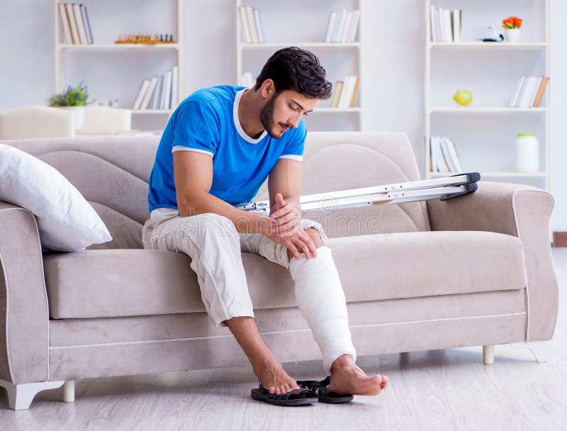 Injured Young Man Recovering at Home Stock Photo - Image of health ...