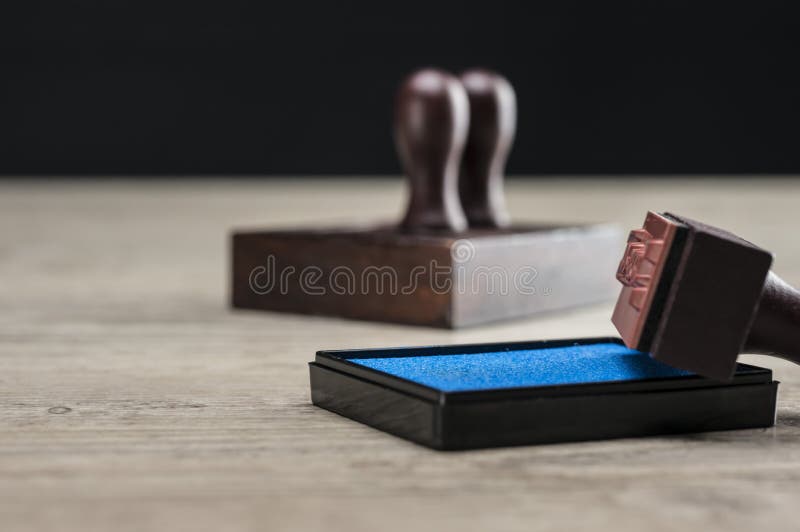 Ink box and rubber stamps stock photo. Image of brown - 95513506