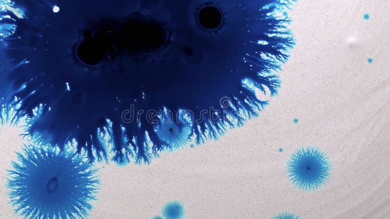Ink Drops and Surreal Shapes Spread on Background Surface Stock Video ...