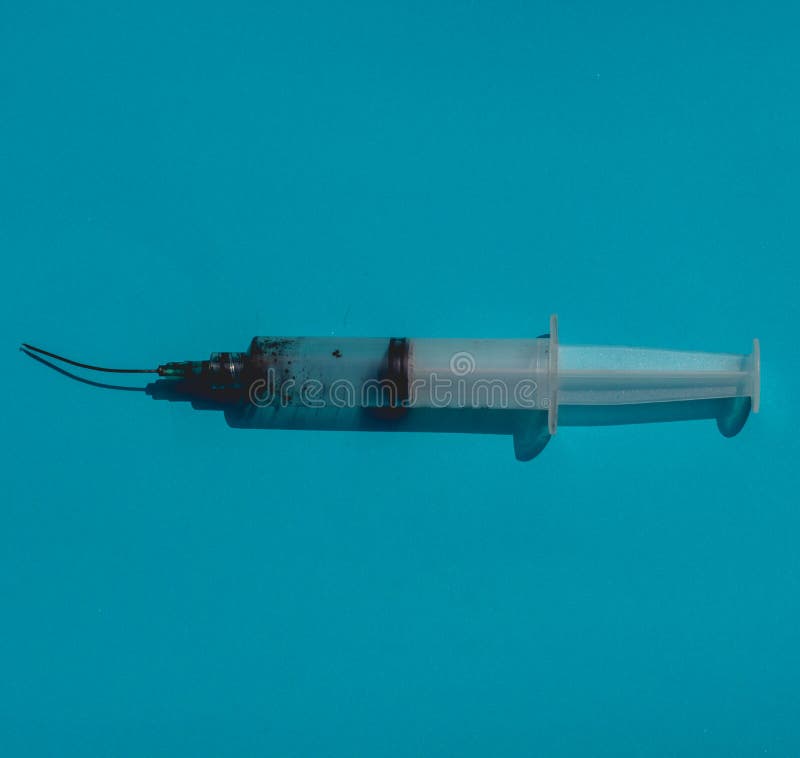 Ink Injection for the Printer. on a Blue Background Stock Photo - Image ...