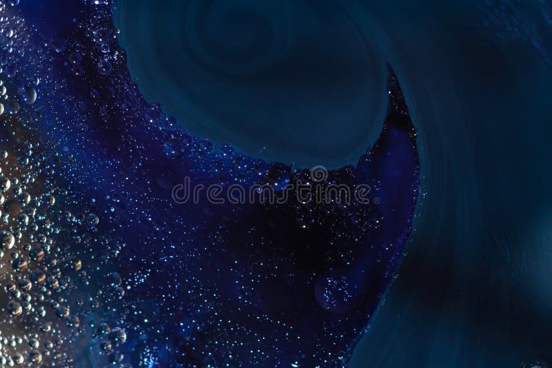Ink and Liquid Blue Color Made Effect of the Outer Space with Tiny ...