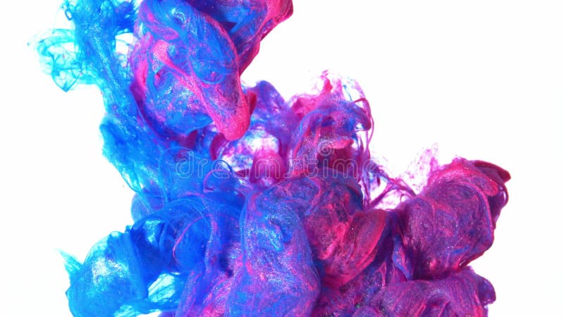 Ink Magic in Slow Motion: Blue and Red Ink Mixing Together on a White ...