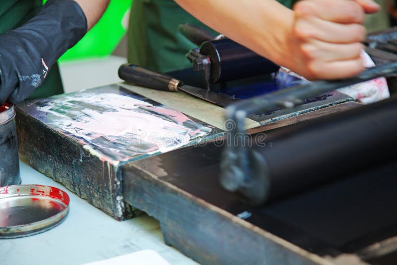 Inking and printing stock image. Image of persons, white - 118884675