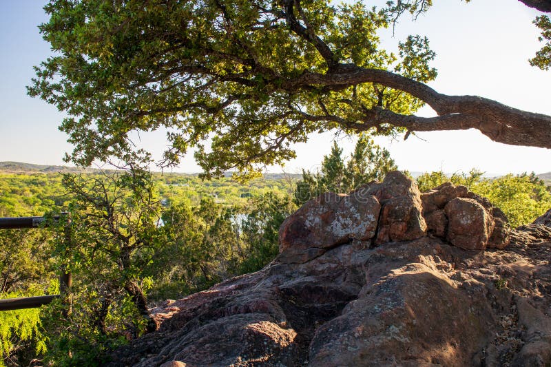 Inks Lake with Gneiss and Live Oak Trees Stock Photo - Image of limb ...