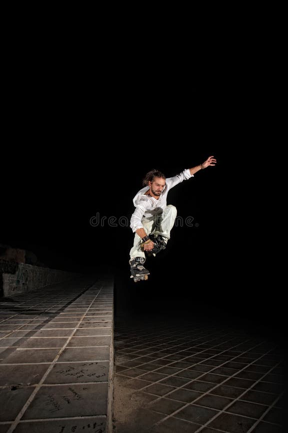 Inline Rider Jumps a Short Wall Stock Image - Image of stability ...