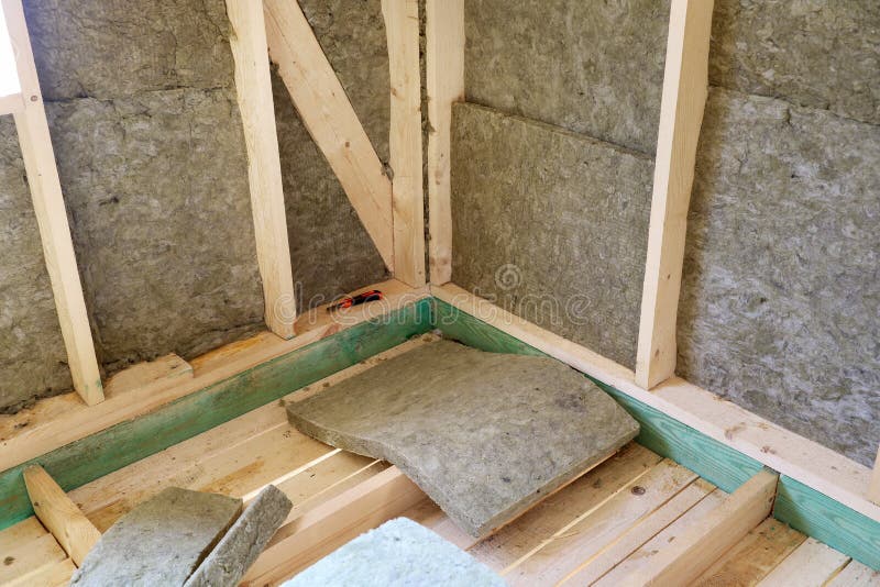 Inner Angle of Frame of House Under Construction with Laying Insulation ...