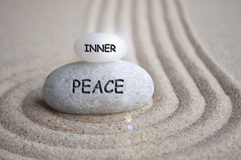 Inner Peace Text Engraved on Zen Stone on Sand with Shining. Inner ...