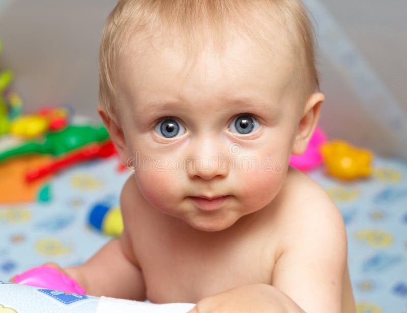 Innocent baby boy plays stock photo. Image of hands, eyes - 25109932