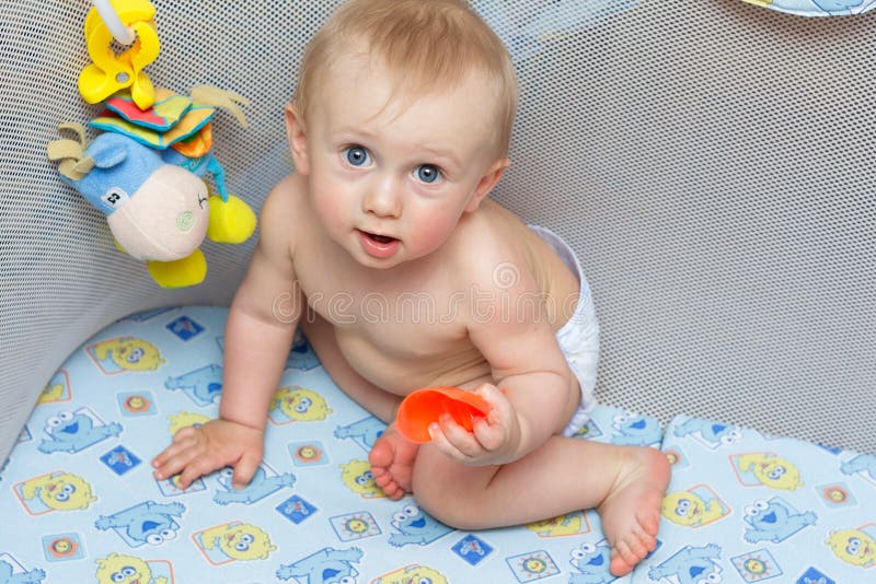 Innocent baby boy plays stock image. Image of lifestyles - 25305711