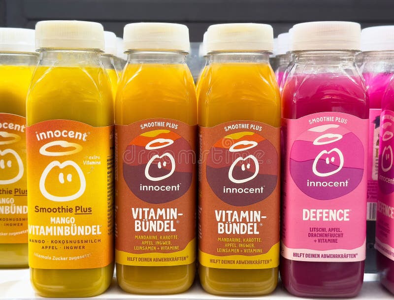 Innocent Smoothie Bottles Displayed with Various Flavors and Vibrant ...