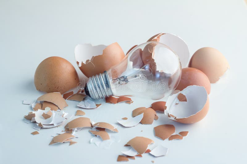 Innovation Bright Ideas Light Bulb Hatching from Egg Shell Stock Image ...