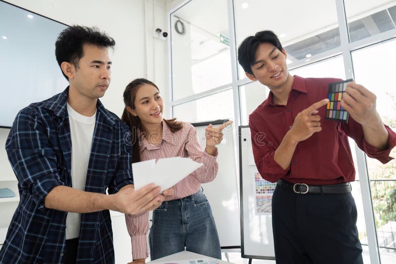 Innovation and Color Analysis. Professionals Collaborating To Finalize ...