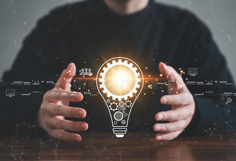 Innovation Design Concept. Hand Holding Light Bulb for New Idea Brain ...